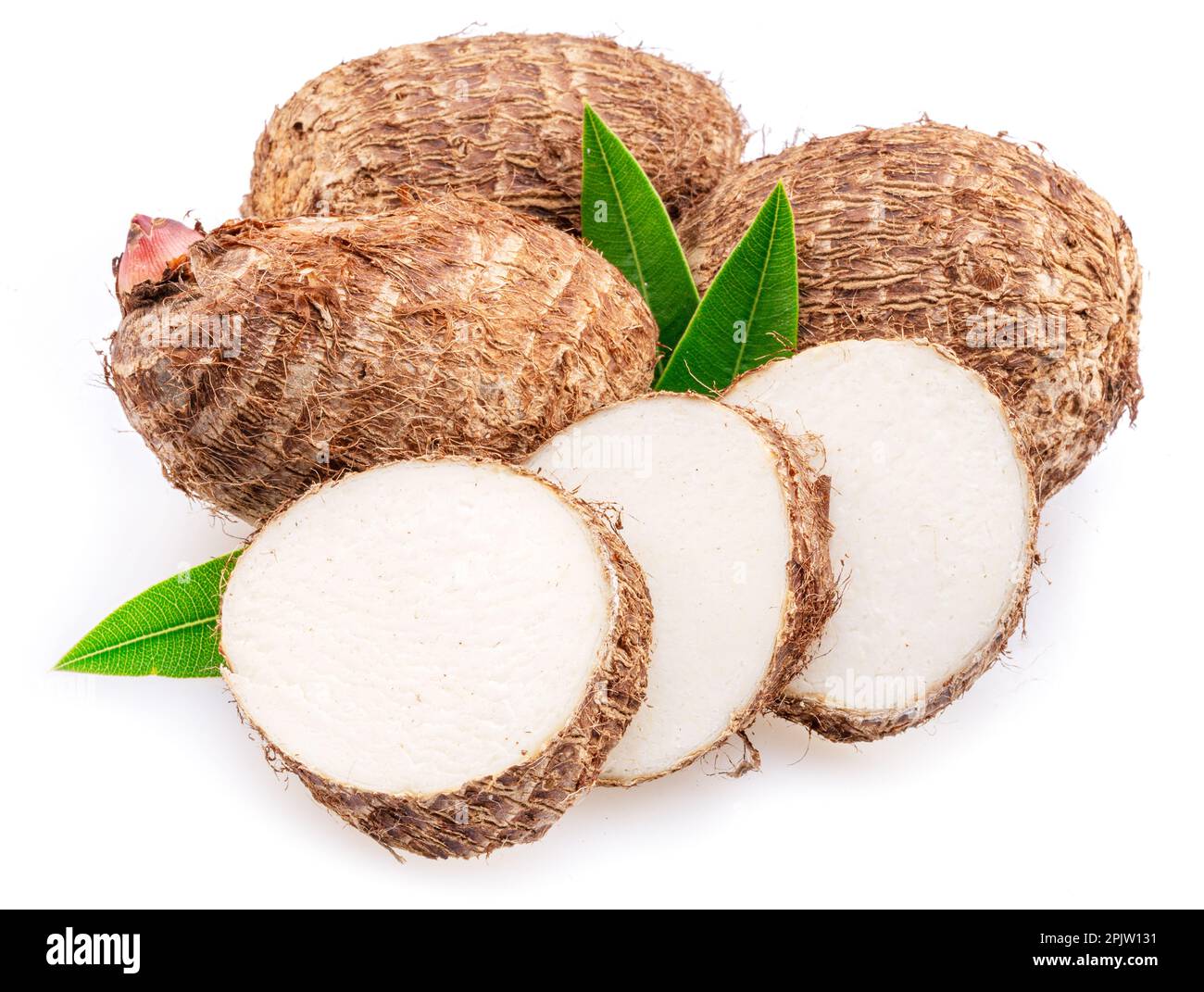 Eddoe or taro tubers and its slices isolated on white background Stock Photo - Alamy