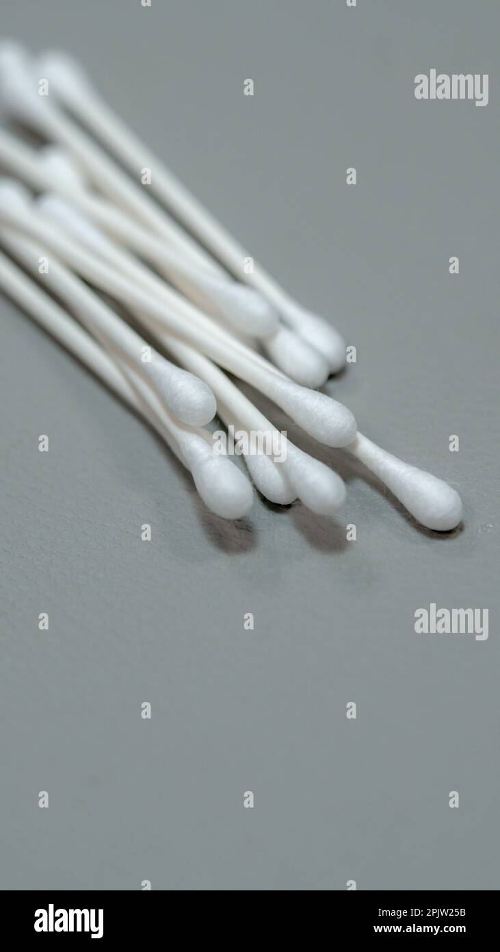 cotton swabs on grey background, close up of cotton swabs Stock Photo ...