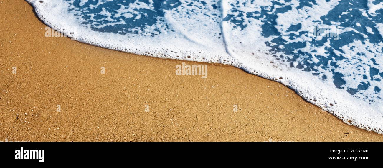 Soft sea wave with a foam on sand beach, text space. sea landscape ...