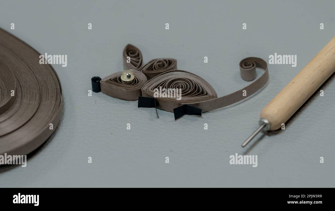 The process of making a Rat from paper, close-up. Quilling Paper Crafts ...