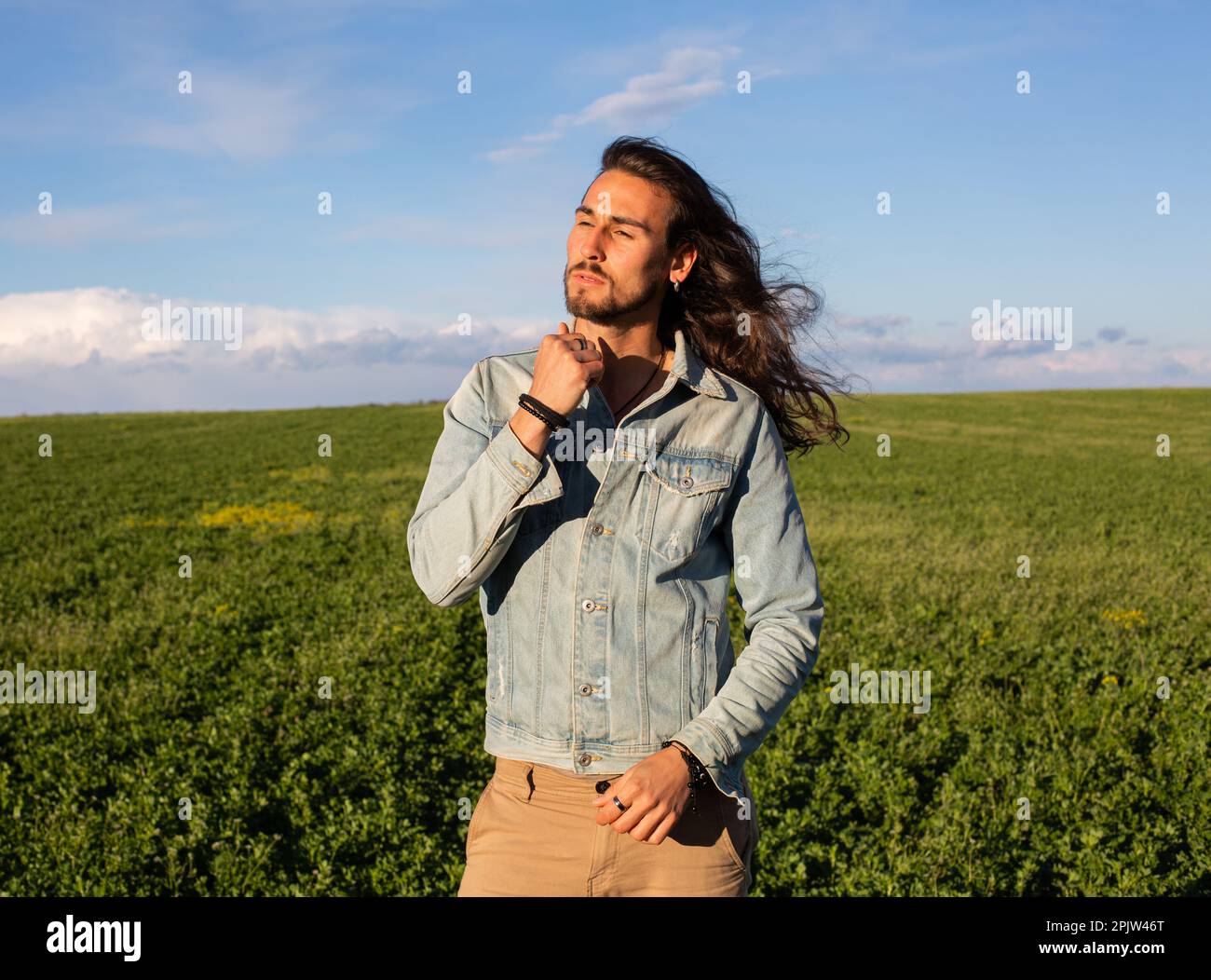 Long hair man Stock Photo - Alamy