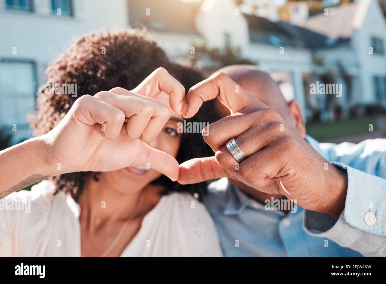Love, couple and heart hands outside of new house, property or real ...