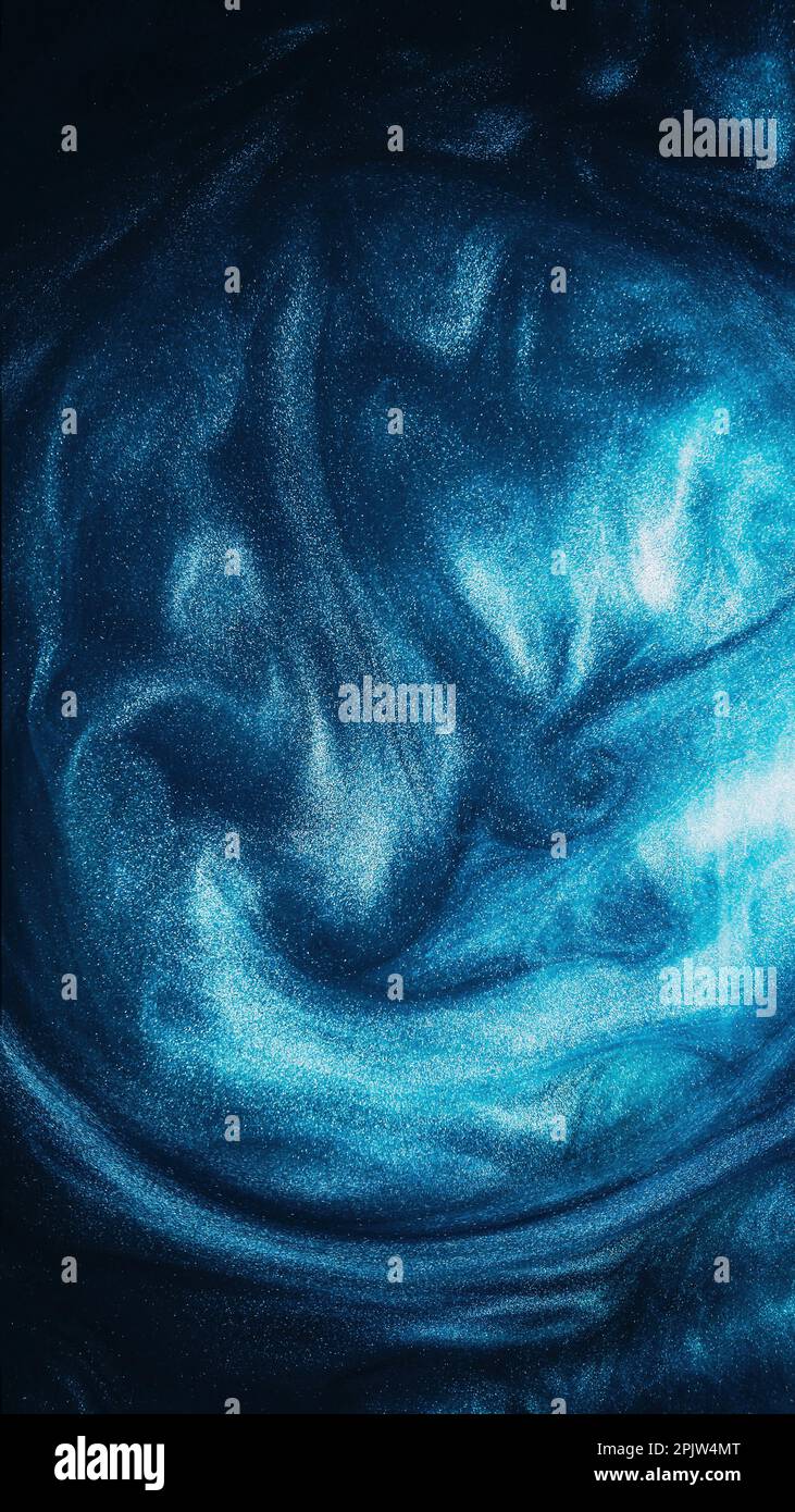 Sparkling fluid ink water blue color glowing vapor Stock Photo - Alamy