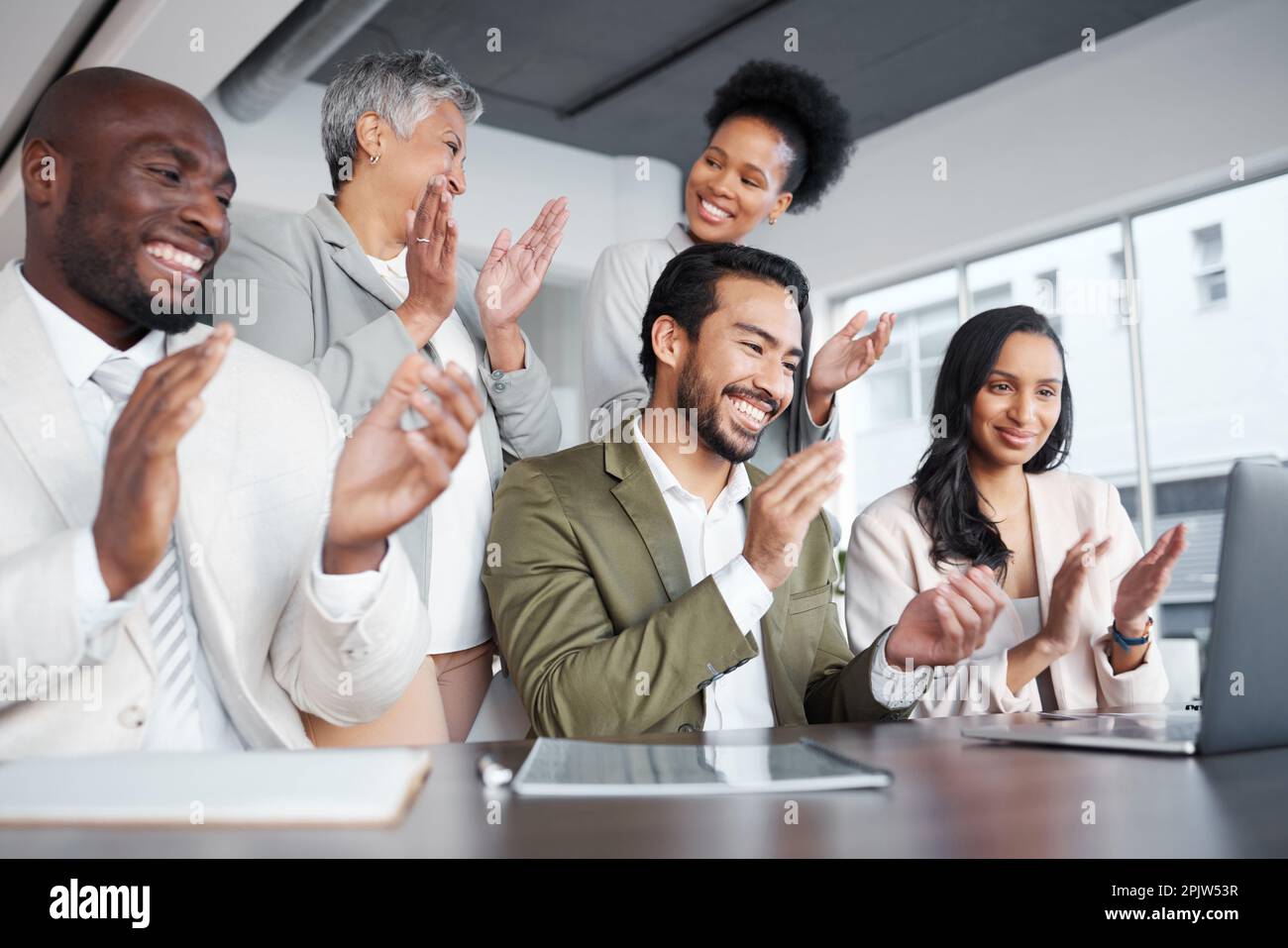 Laptop, business people and clapping hands in meeting for proposal ...