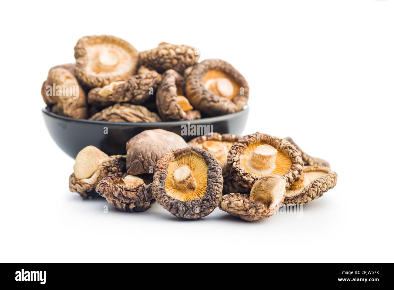 Dried shiitake mushrooms isolated on the white background Stock Photo ...