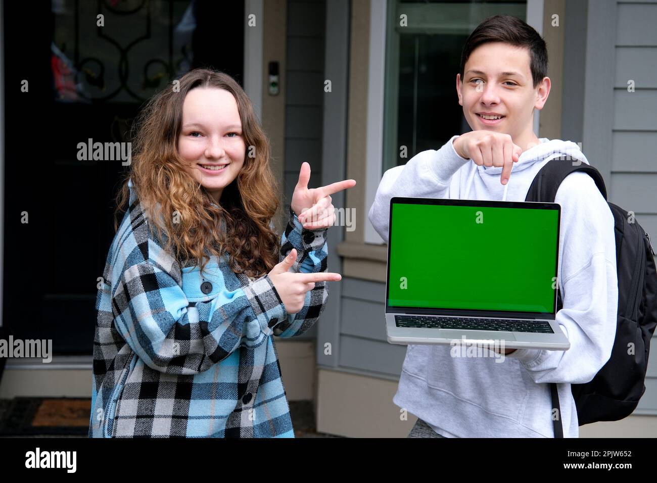 popular cool photo of teens holding laptop green edge chroma key boy ...