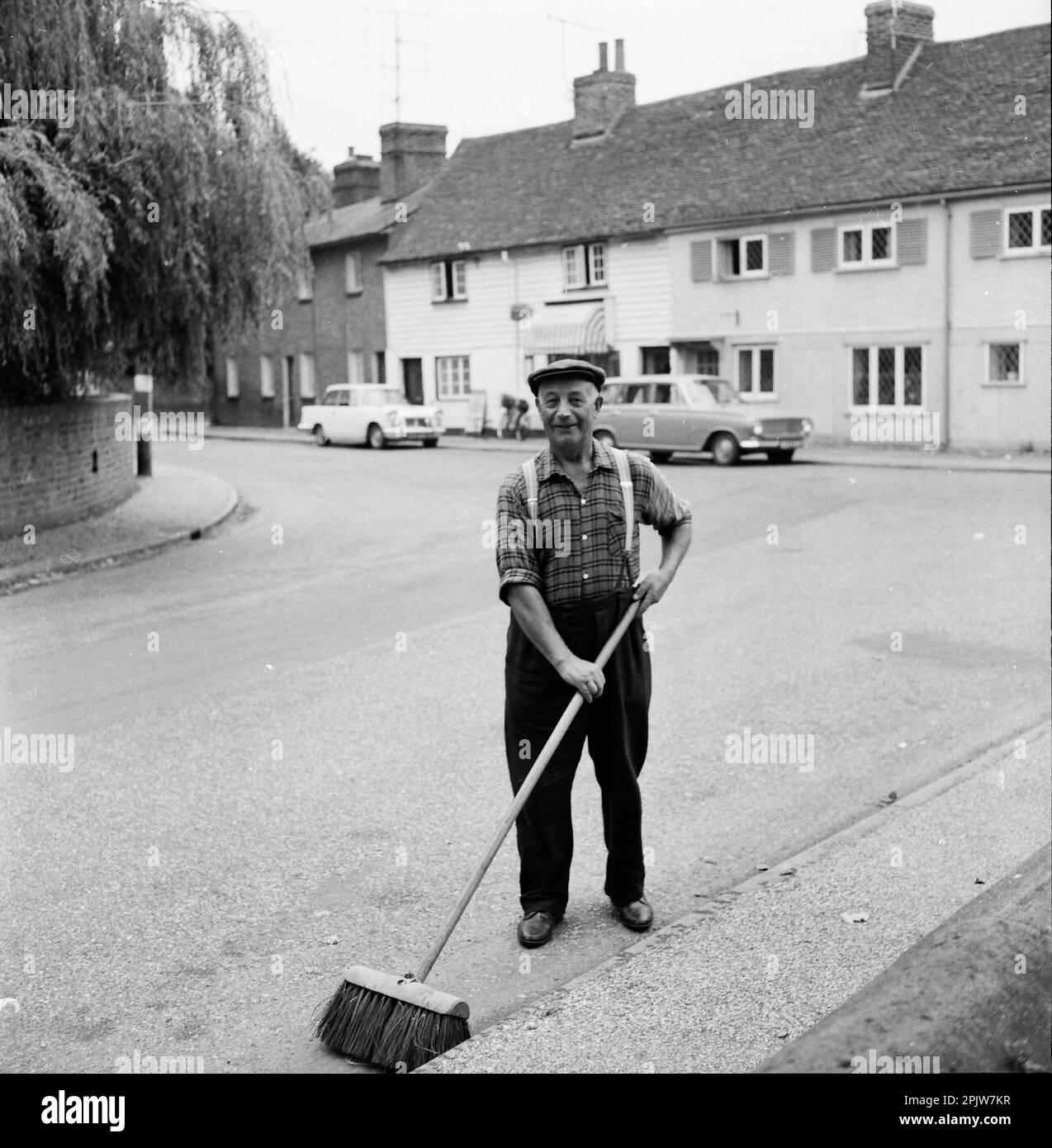 A council road sweeper keeping the roads clean in bradwell village ...