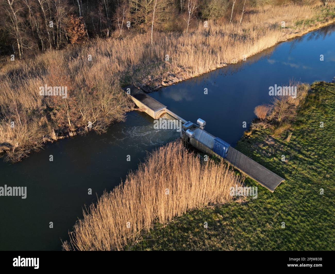 Aerial view of a large dam situated on a river Stock Photo - Alamy