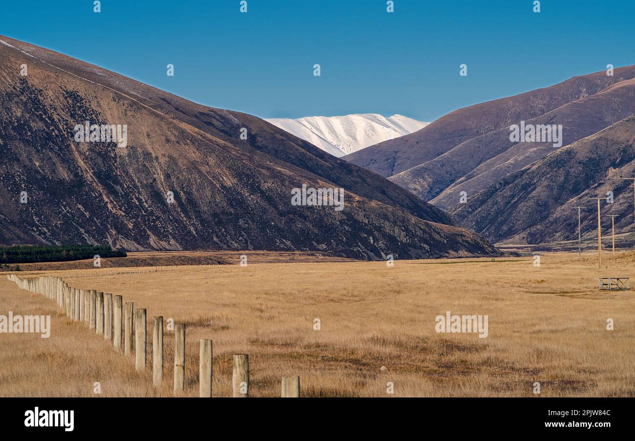 Snow capped mountains in the valley Stock Photo - Alamy