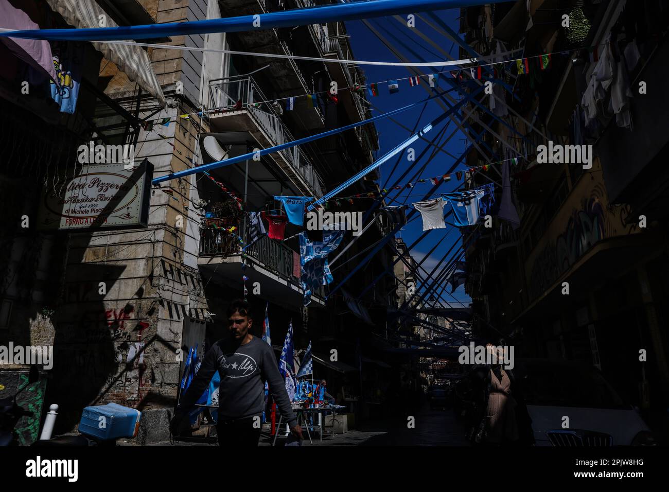 Neapel, Italy. 04th Apr, 2023. A street is decorated the club colors of ...