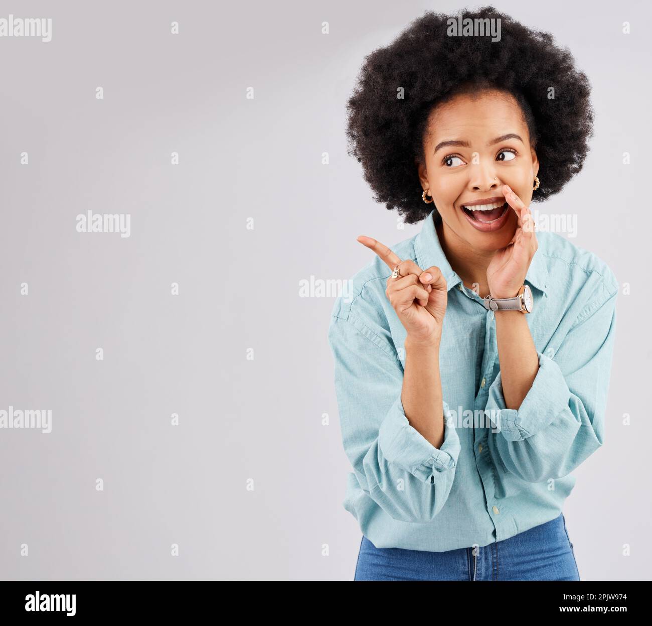 Gossip, wow and woman pointing in a studio telling a secret feeling ...