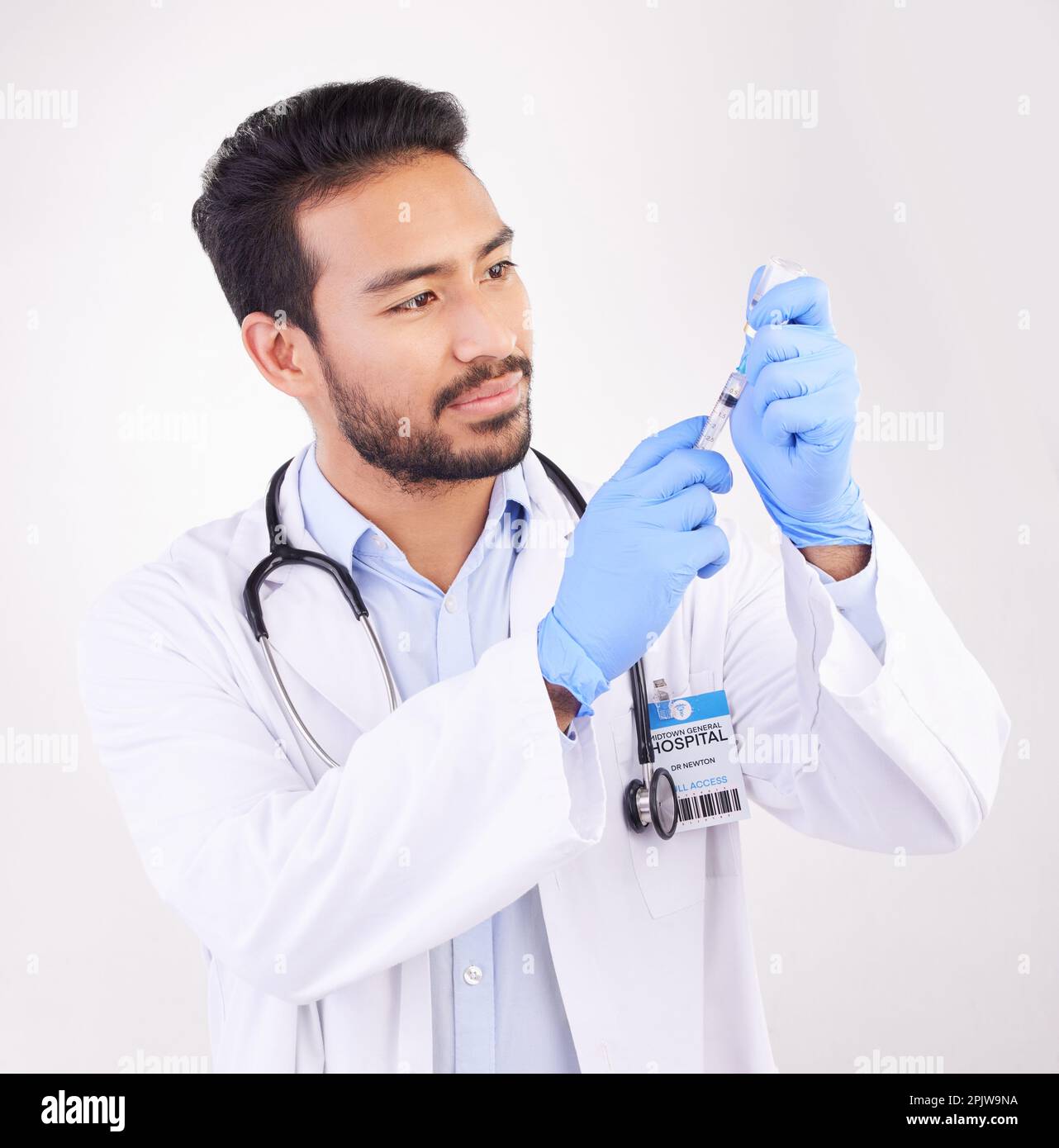 Healthcare, vaccine and man doctor with injection or shot in studio ...