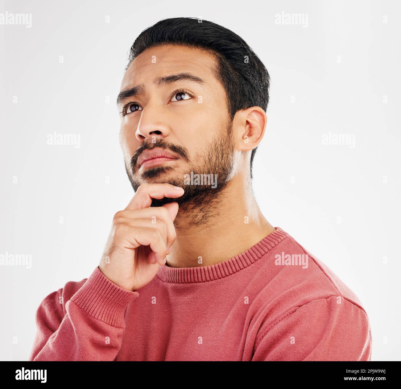 Serious man, thinking face and ideas in studio, white background and ...