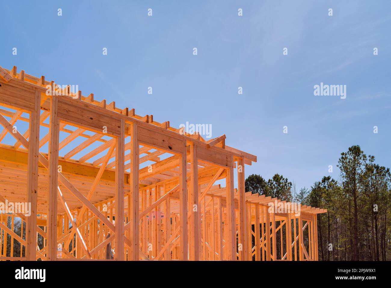 There are beams of wood stick framing to framework new house in ...