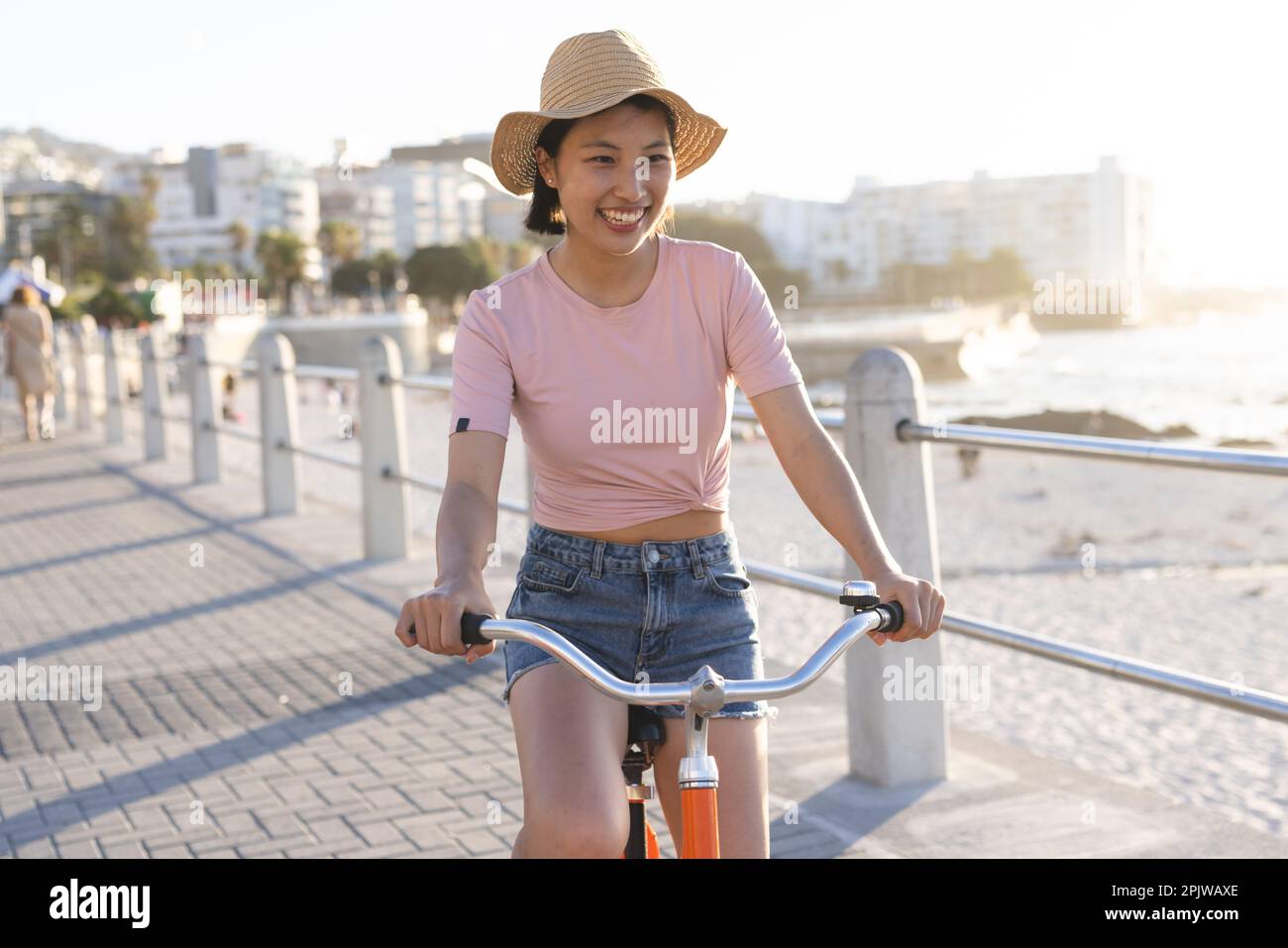 Asian riding bike hi-res stock photography and images - Alamy