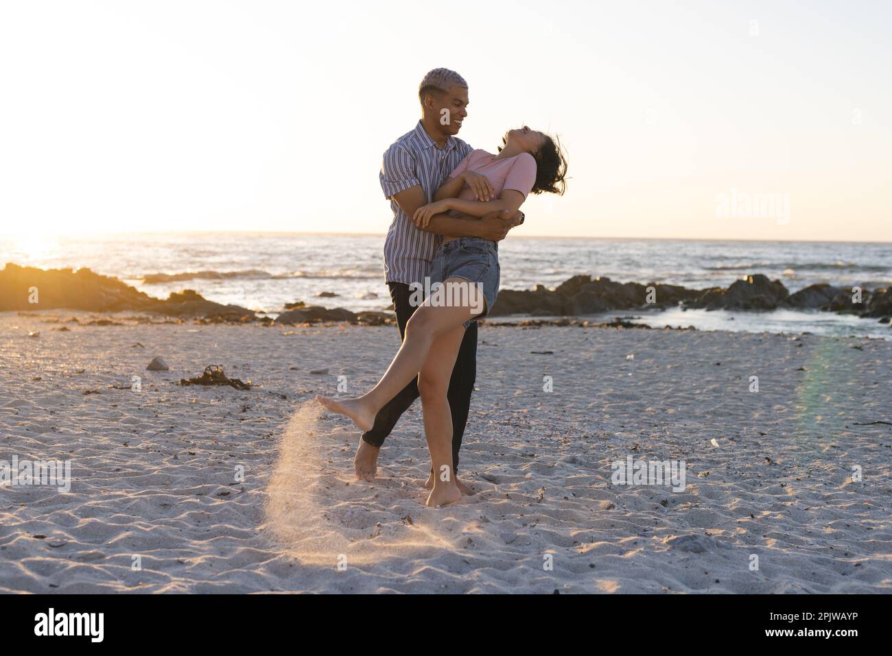Happy young couple dancing together hi-res stock photography and images ...