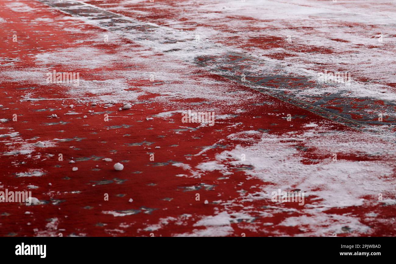 Red carpet covered with snow Stock Photo - Alamy
