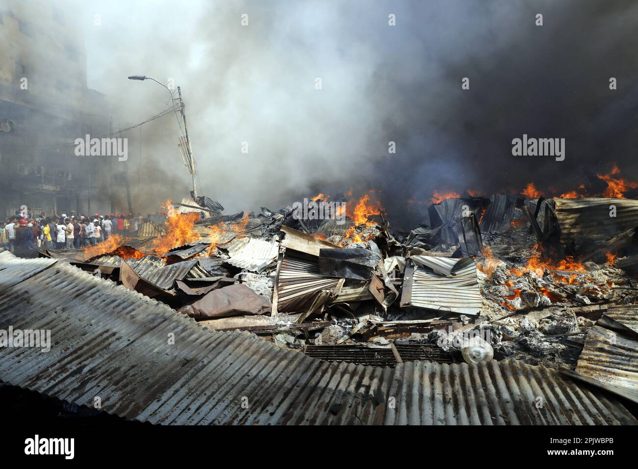 Dhaka, Bangladesh, 04/04/2023, Smoke fills the air during a fire at the ...
