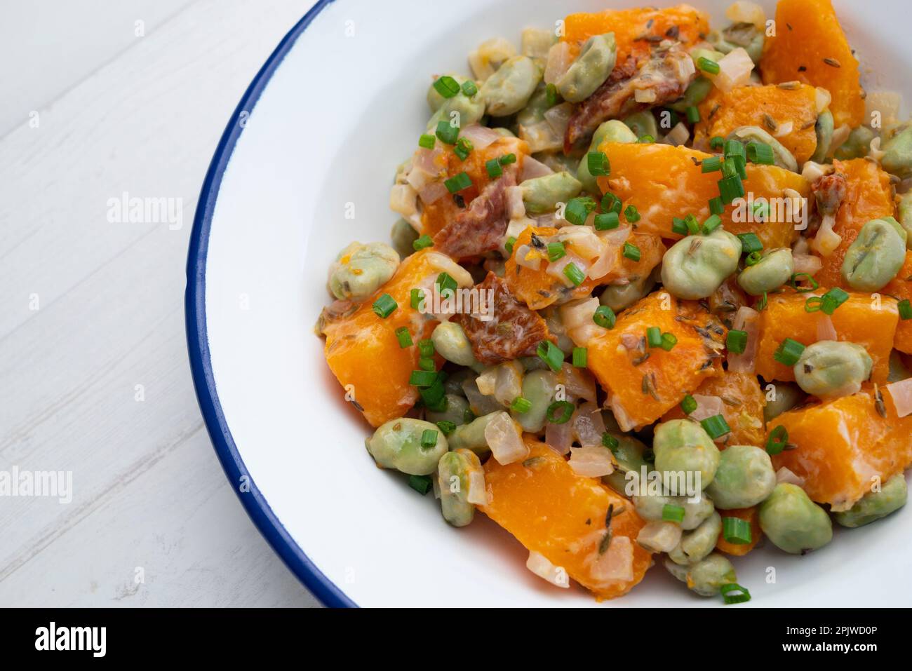Sautéed pumpkin with broad beans. Traditional Spanish recipe Stock ...