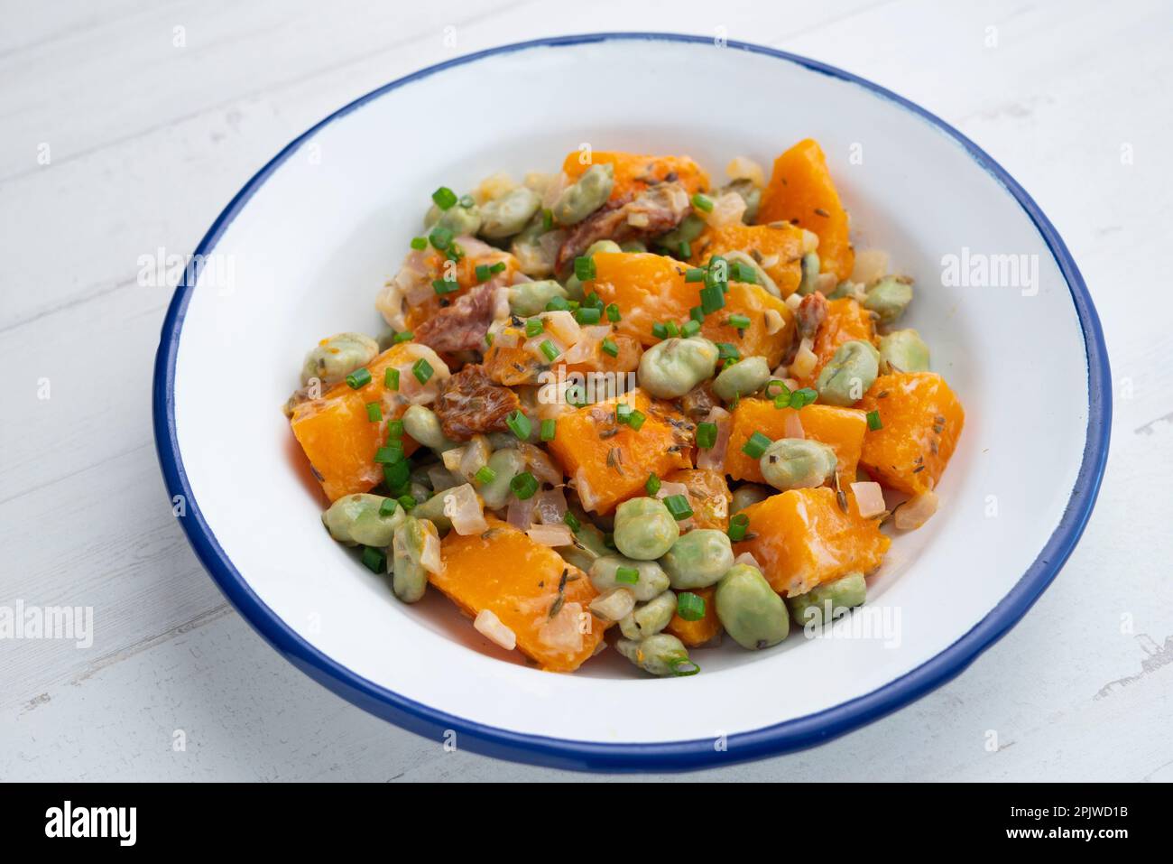 Sautéed pumpkin with broad beans. Traditional Spanish recipe Stock ...