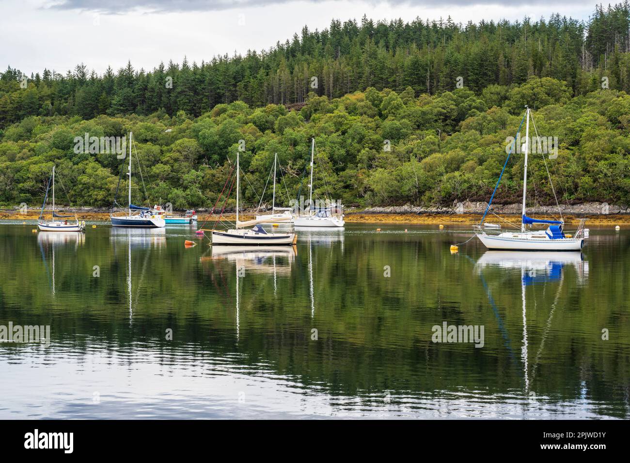 Yachts moored at Salen Jetty on Loch Sunart on the Ardnamurchan ...