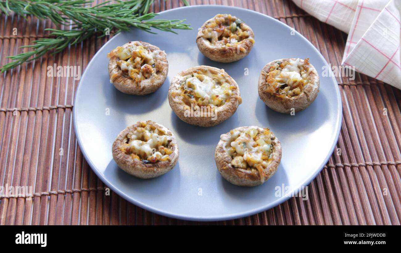 Baked mushrooms stuffed with walnuts and cheese. Traditional Spanish ...