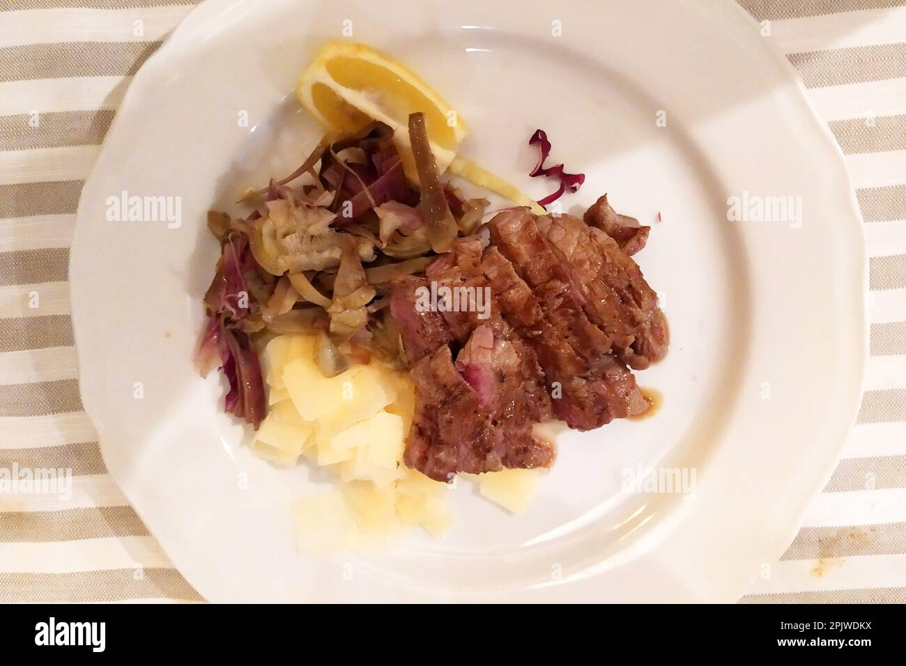 Food, Sliced Beef with Artichokes and Parmesan Flakes Stock Photo - Alamy