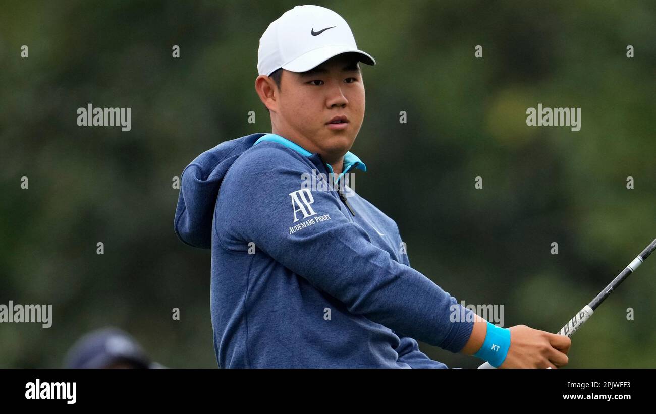 Si Woo Kim, of South Korea, hits off the 10th tee hole during a ...