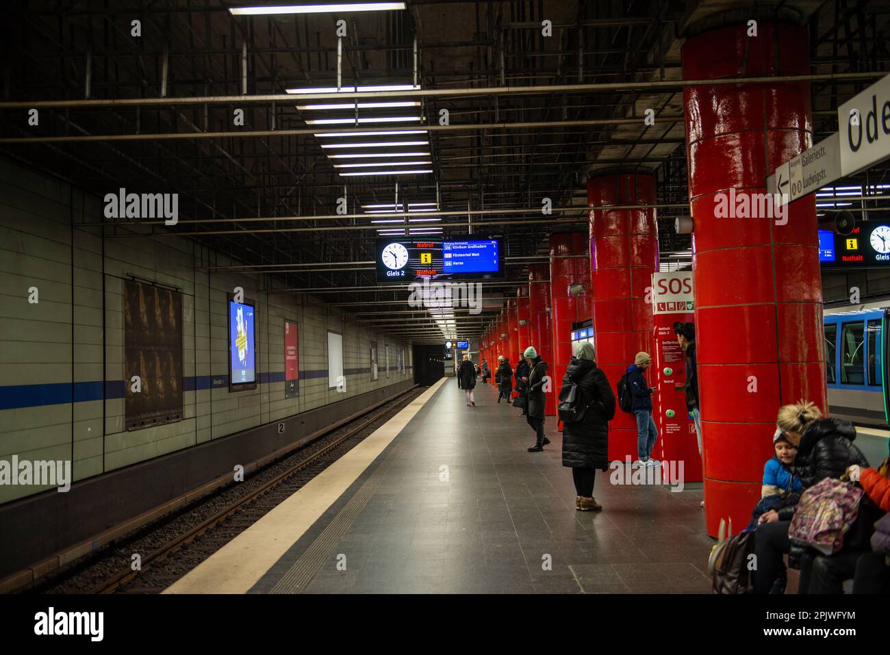 Munich,Germany-April 3,2023: Commuters wait for their subway train ...
