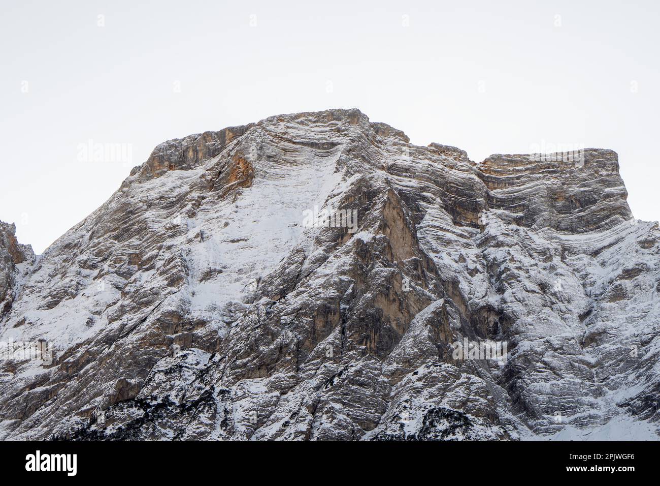 View from Lake Braies with snow, Croda del Becco mountain, Trentino ...