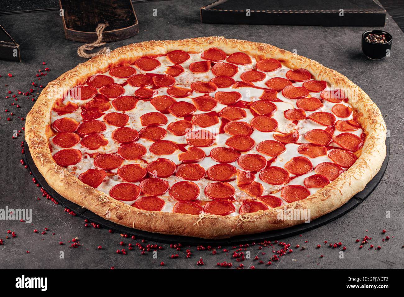 Fresh giant pizza pepperoni with cheese Stock Photo - Alamy