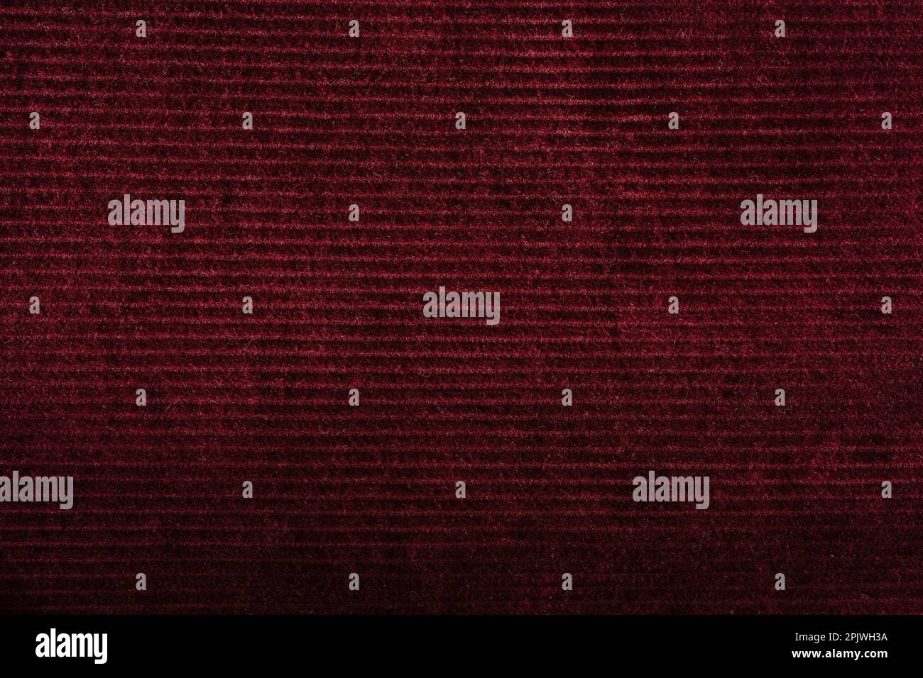 Burgundy red corduroy background texture. Ribbed velvet textile pattern ...