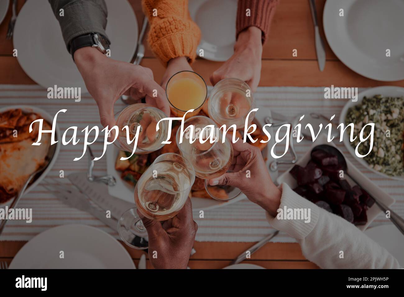 People, hands and cheers for happy thanksgiving dinner, fine dining or ...