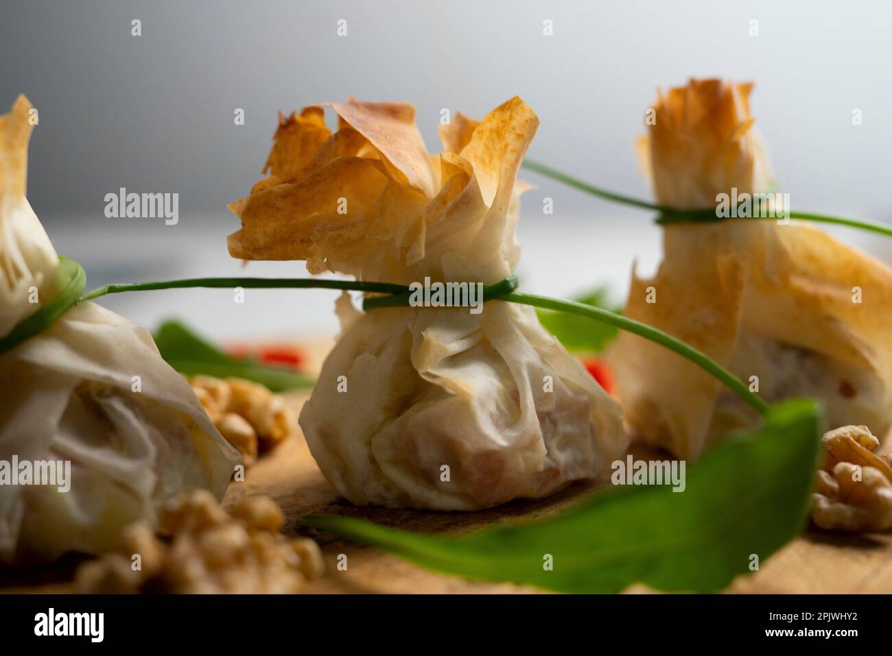 Oven-baked filo pastry vegetable packets Stock Photo - Alamy