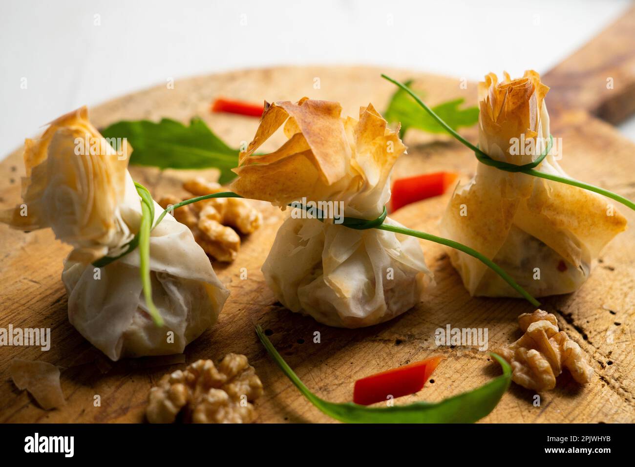 Oven-baked filo pastry vegetable packets Stock Photo - Alamy