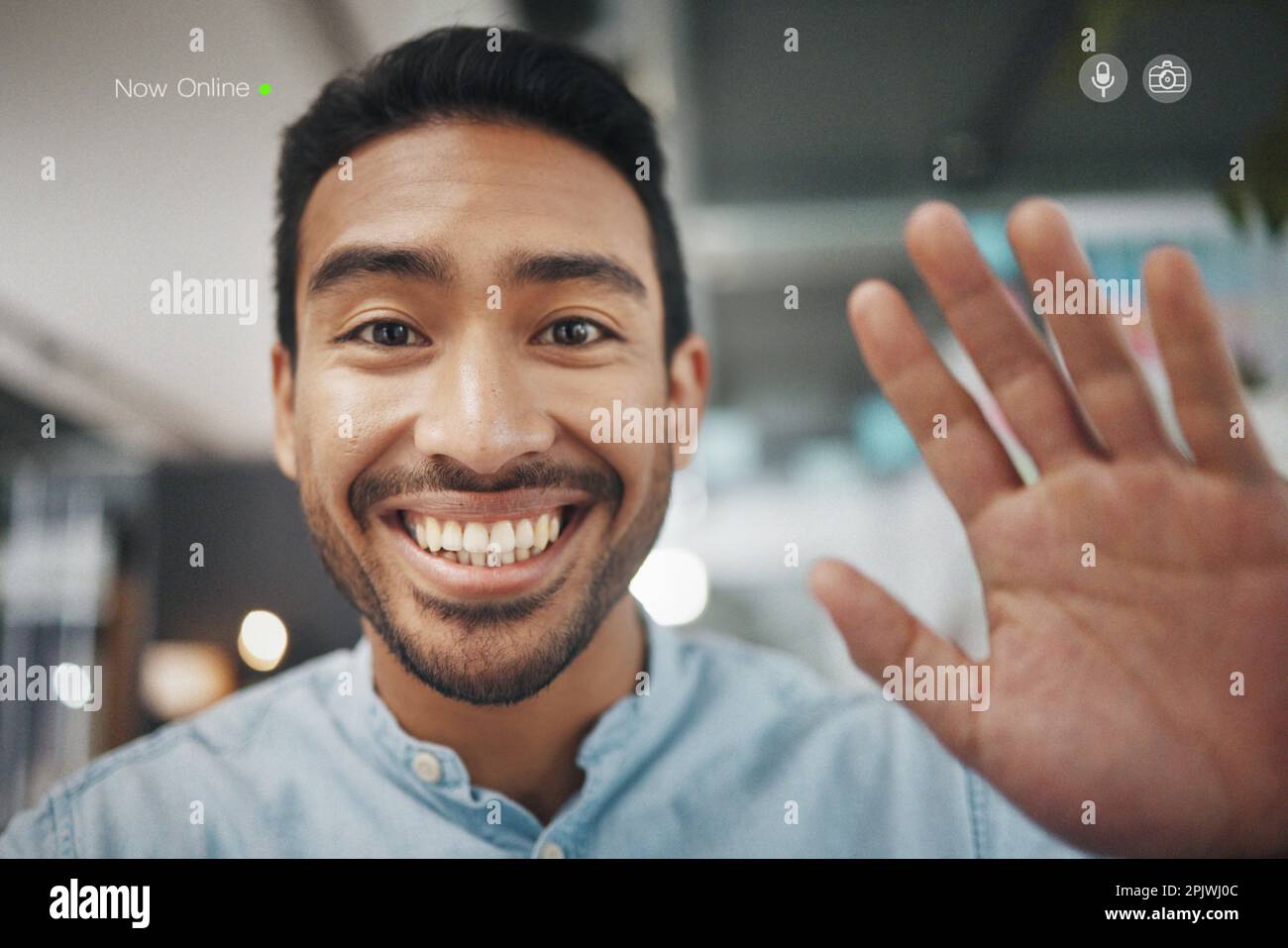 Portrait, video call and wave by man in office, happy and smile for ...