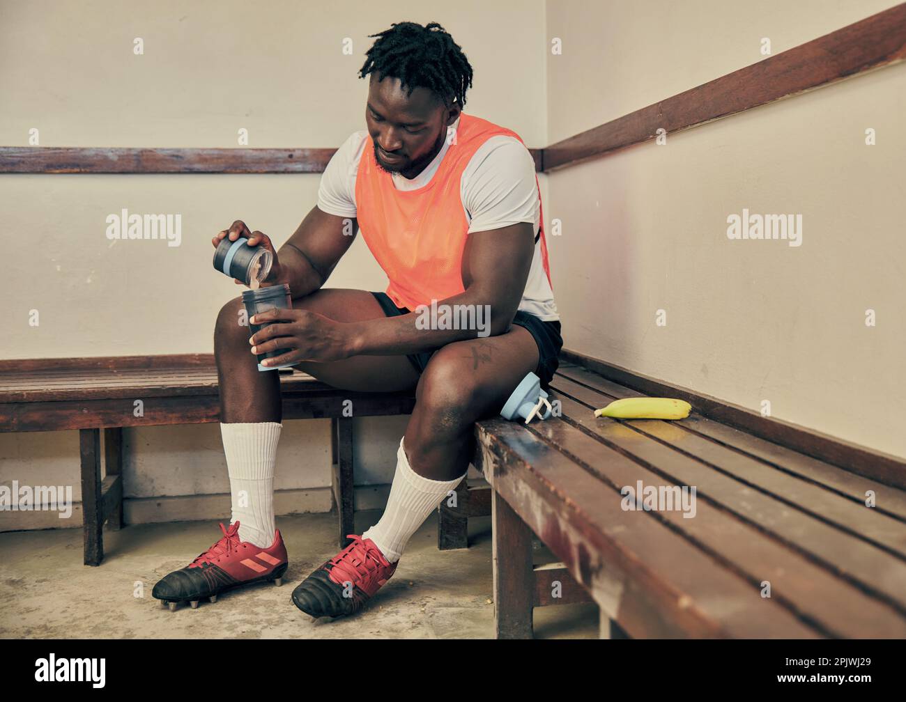 Sports, protein shake and black man in locker room with drink ...