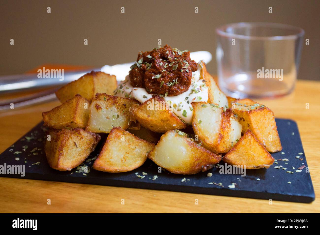 Papas bravas, are a typical preparation of bars in Spain consisting of ...