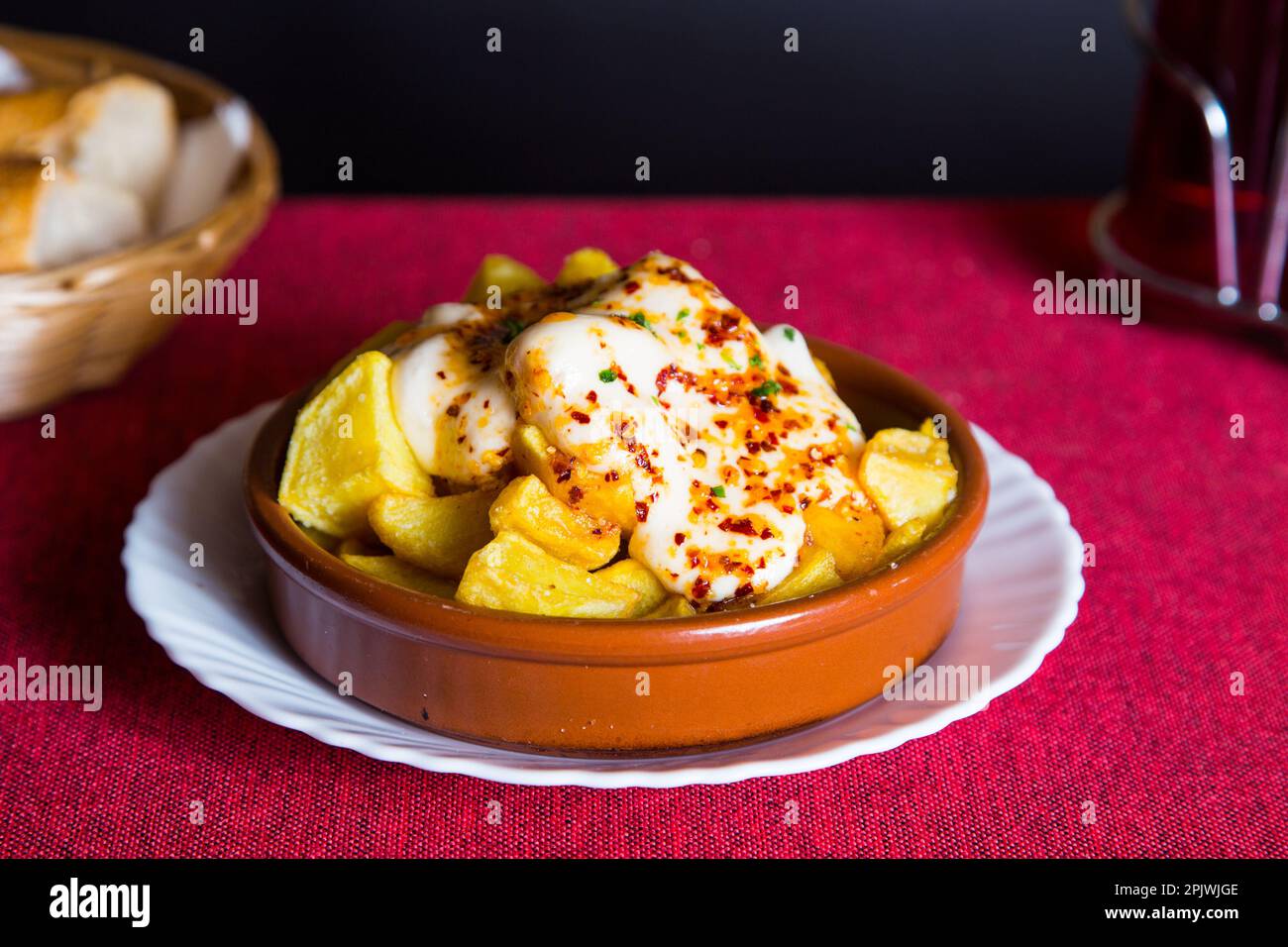 Papas bravas, are a typical preparation of bars in Spain consisting of ...