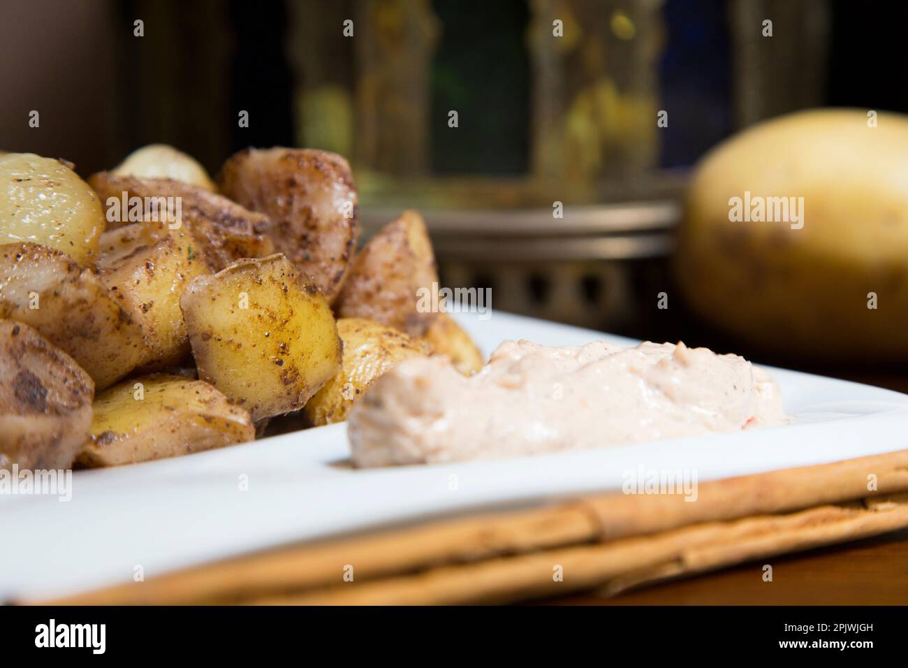 Papas bravas, are a typical preparation of bars in Spain consisting of ...
