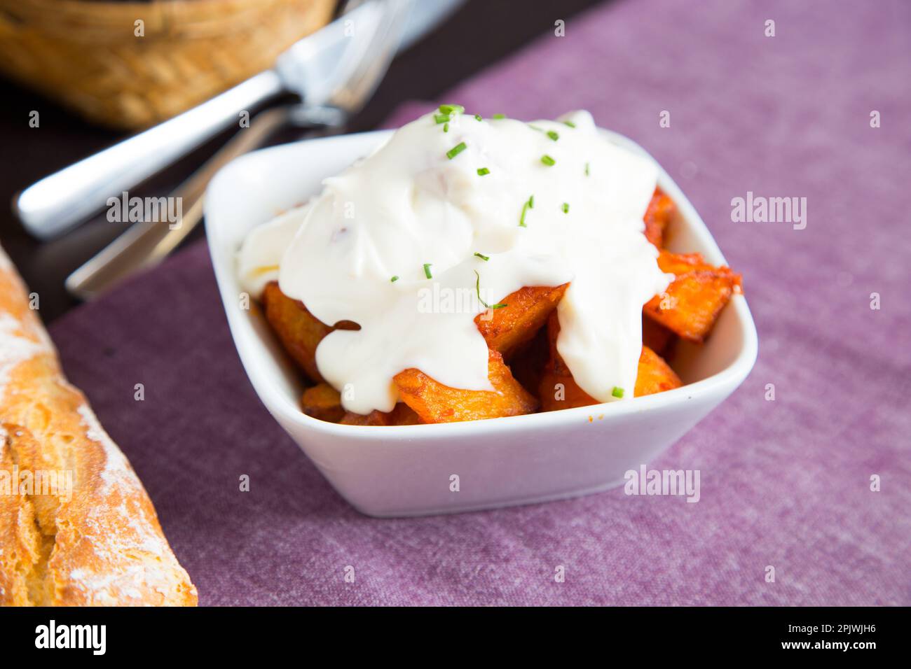 Papas bravas, are a typical preparation of bars in Spain consisting of ...