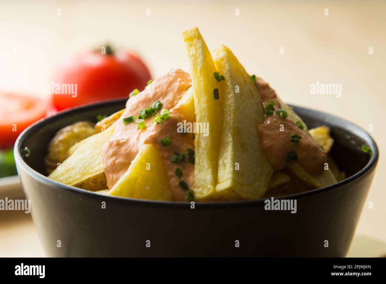 Papas bravas, are a typical preparation of bars in Spain consisting of ...