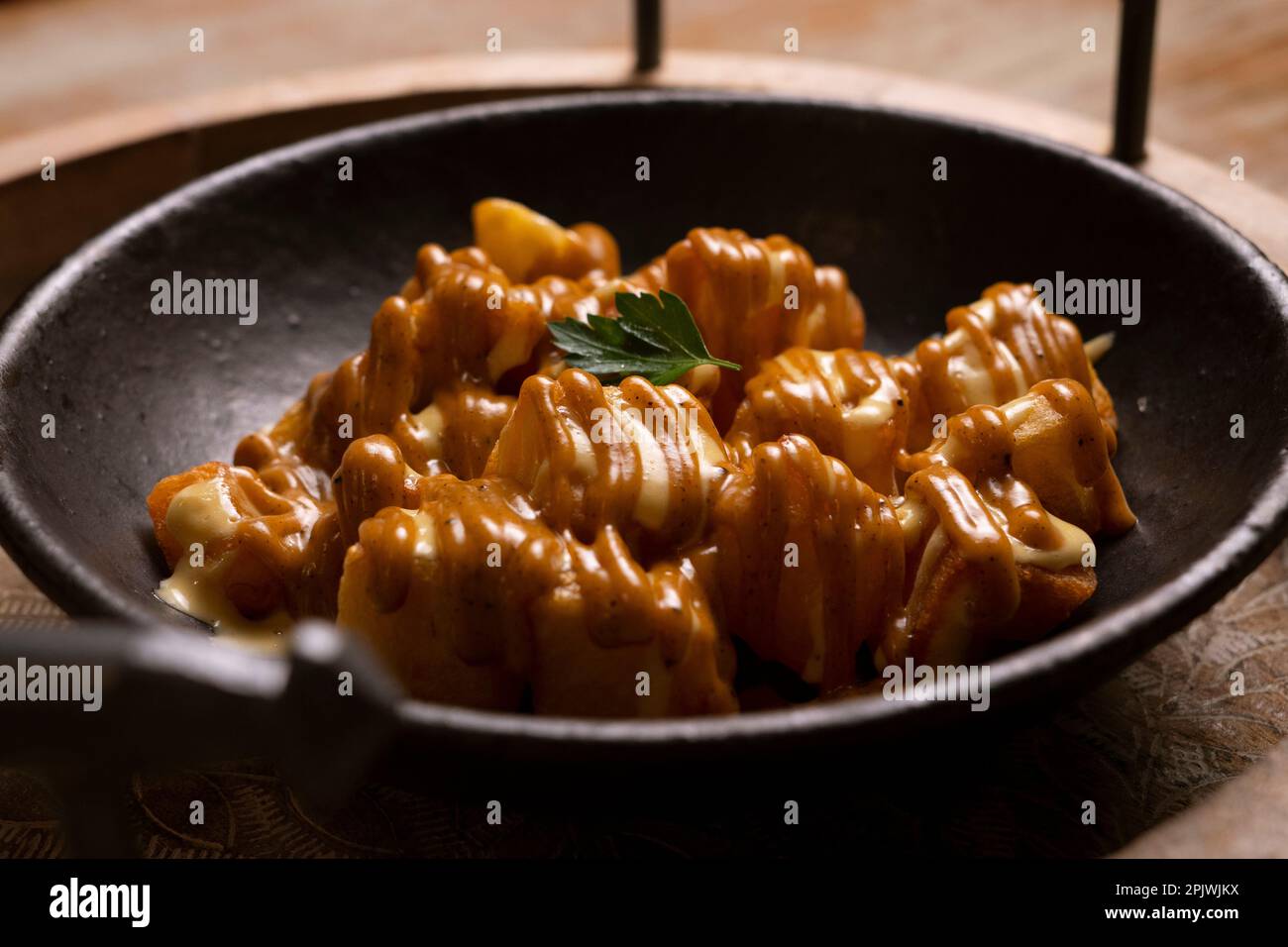 Papas bravas, are a typical preparation of bars in Spain consisting of ...