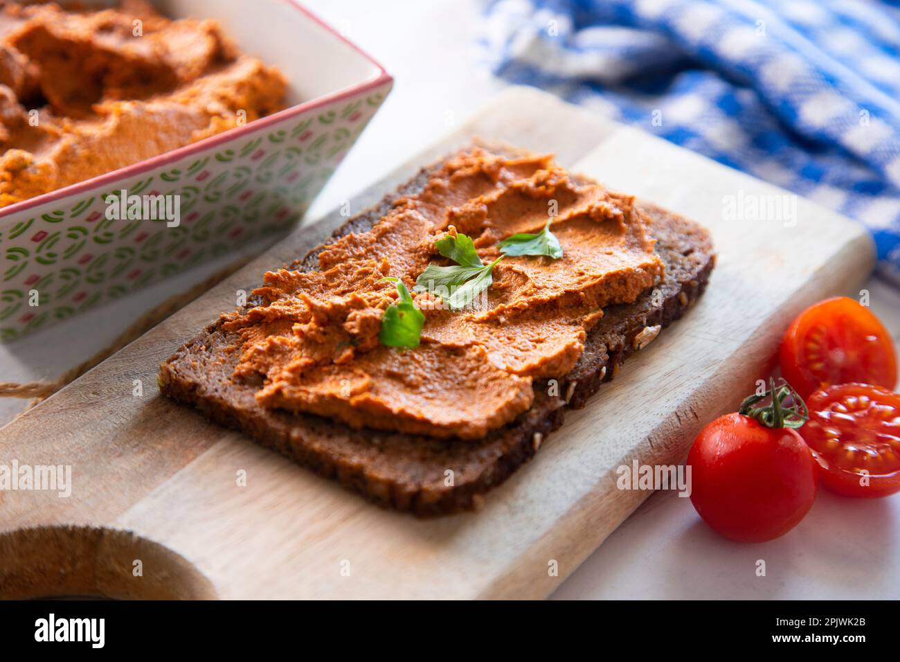 Toast with vegetarian pate made with dried tomato and other vegetables ...