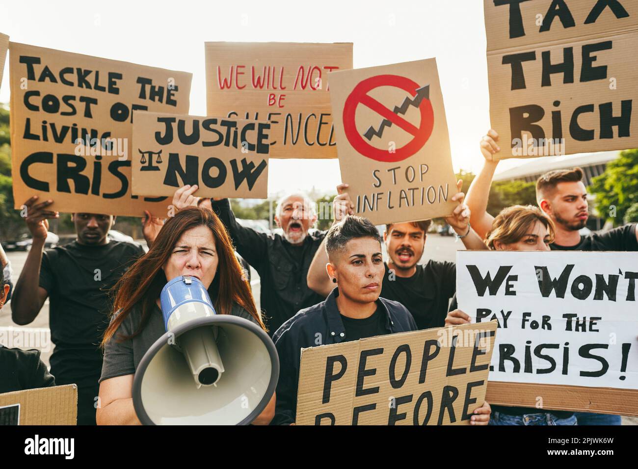 Crowd of multiracial people protest against inflation and financial ...