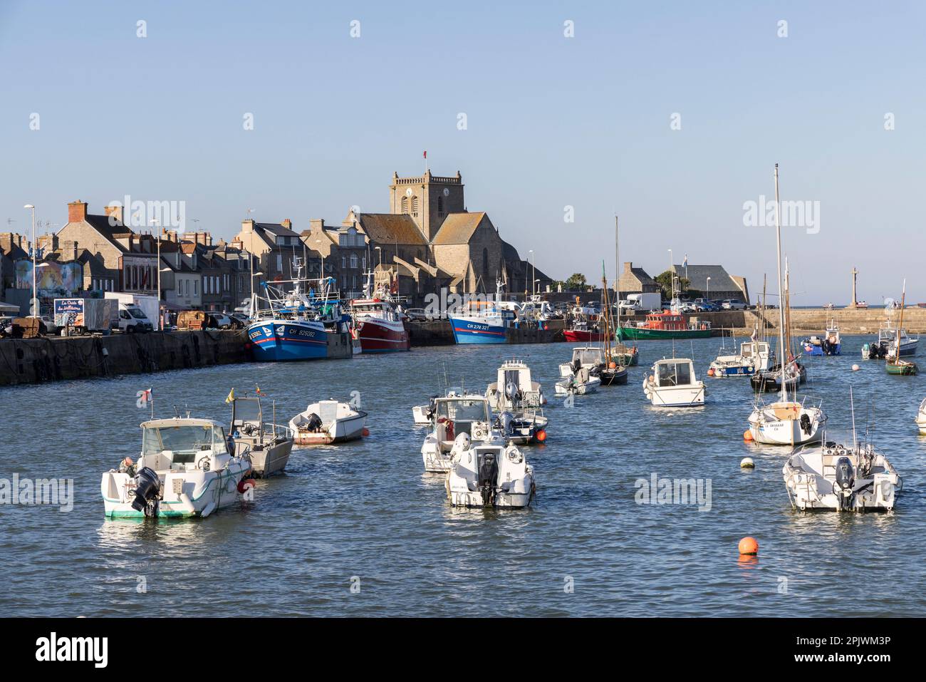 Boats moored in natural harbour, Barfleur, Manche, Normandy, France ...