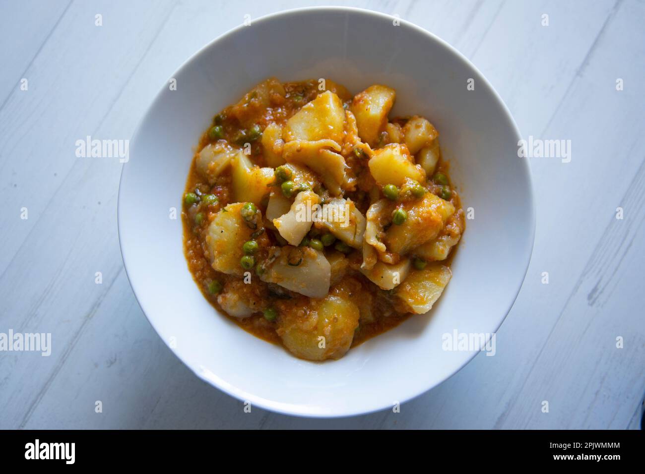 Stewed cuttlefish with potatoes. Traditional Spanish tapa recipe Stock ...