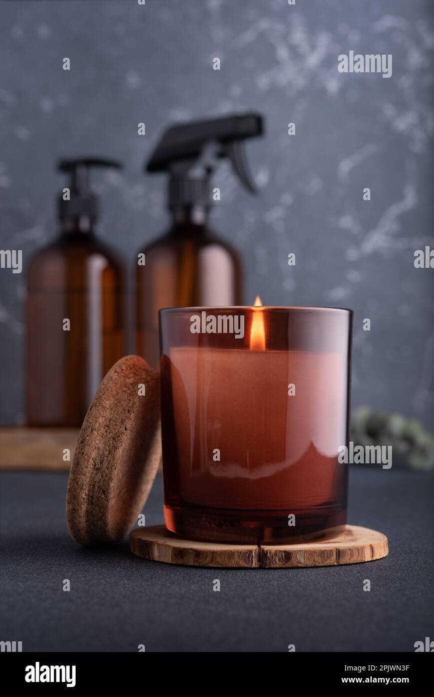 Spa composition with burning candle and recycled dispenser bottles for ...
