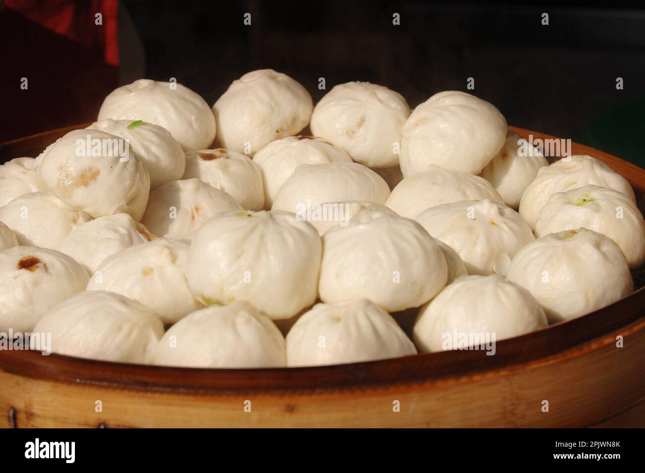The typical wooden pot for cooking steamed buns. Shanghai, China, Asia ...