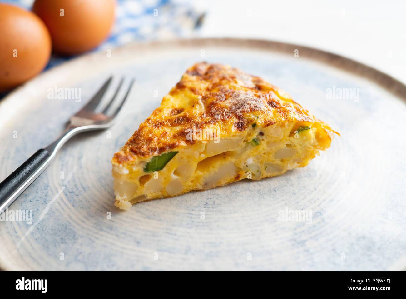 Tortillas de patatas traditional Spanish recipe with zucchini and eggs ...